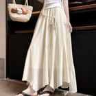 Shinsei - High Waist Plain Asymmetrical Maxi A-Line Skirt | YesStyle