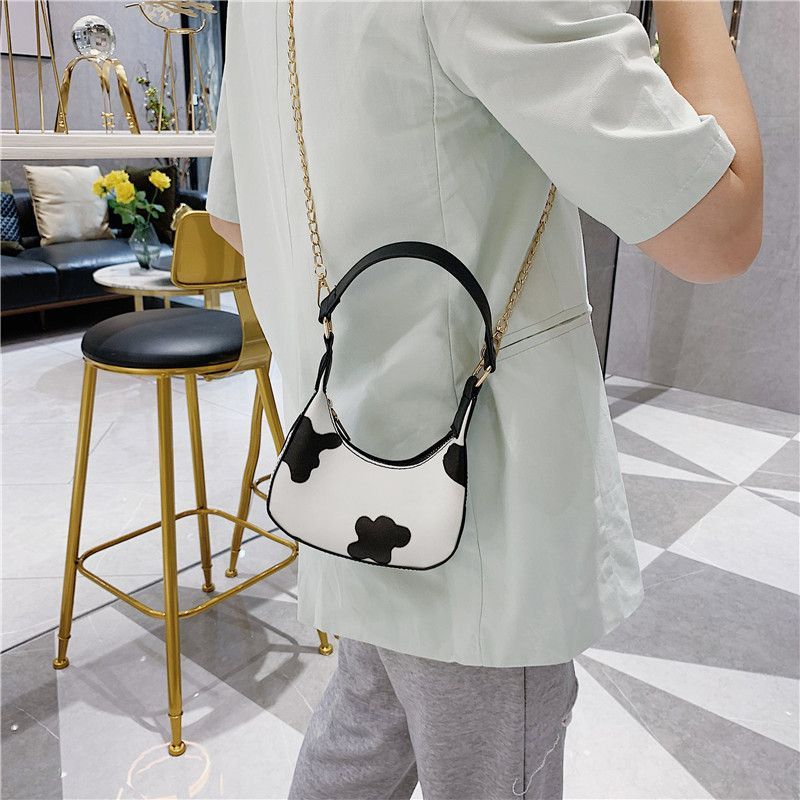 Faneur Cow Print Shoulder Bag | YesStyle