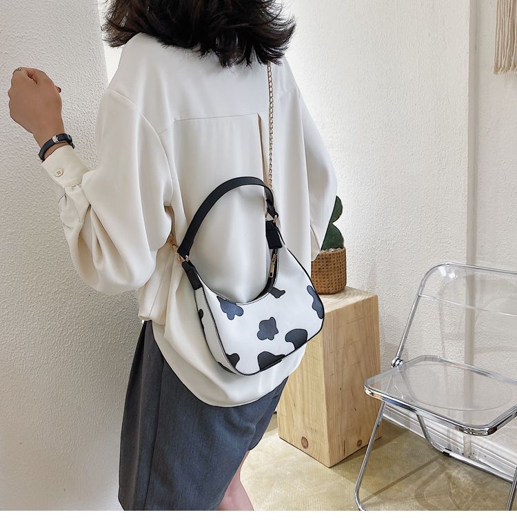 Faneur Cow Print Shoulder Bag | YesStyle