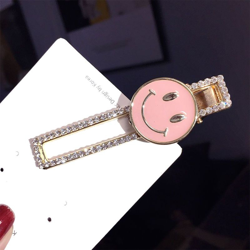 Mesmeriz Smiley Face Hair Clip | YesStyle