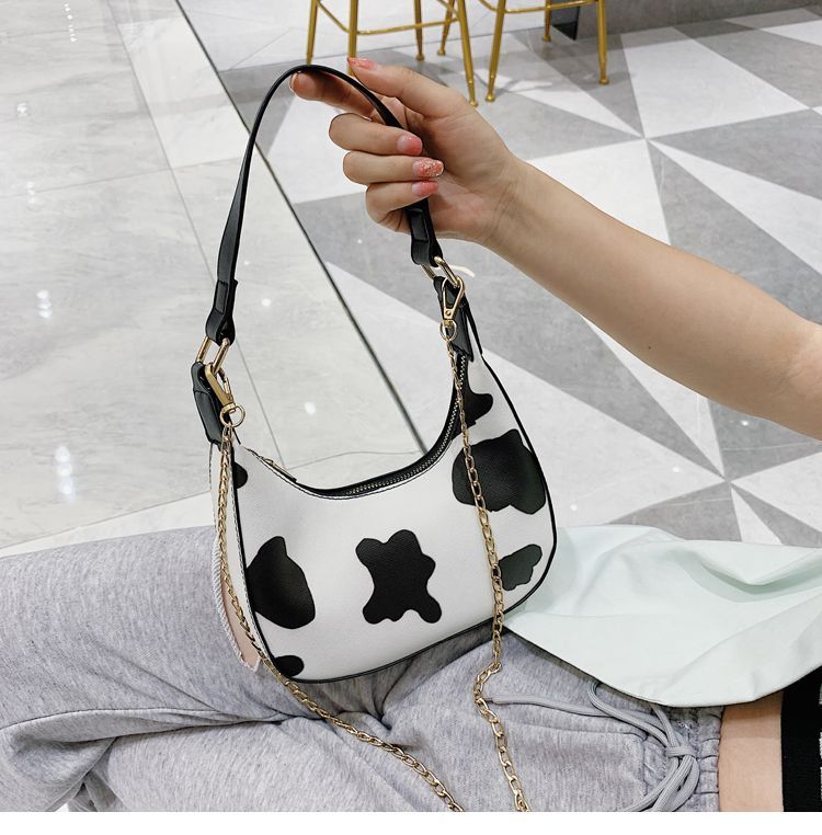 Faneur Cow Print Shoulder Bag | YesStyle