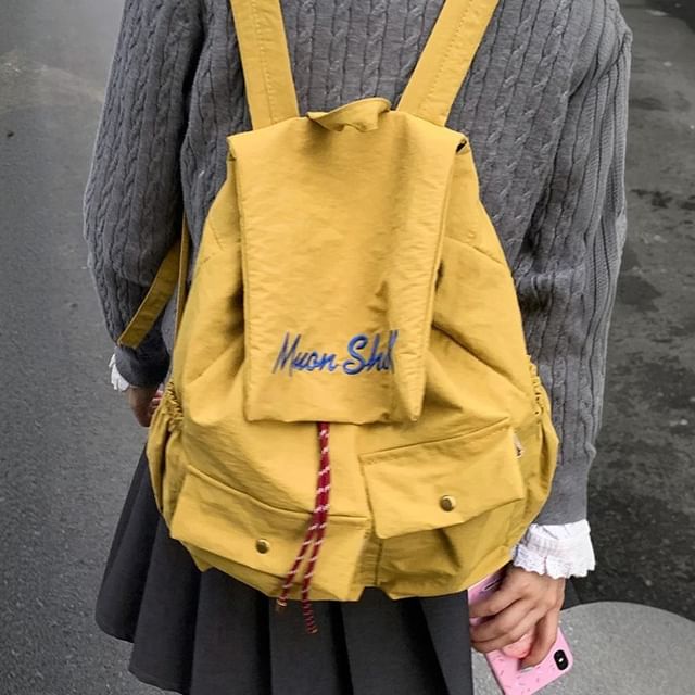 Fran San - Letter Embroidered Multi-Pocket Flap Backpack | YesStyle